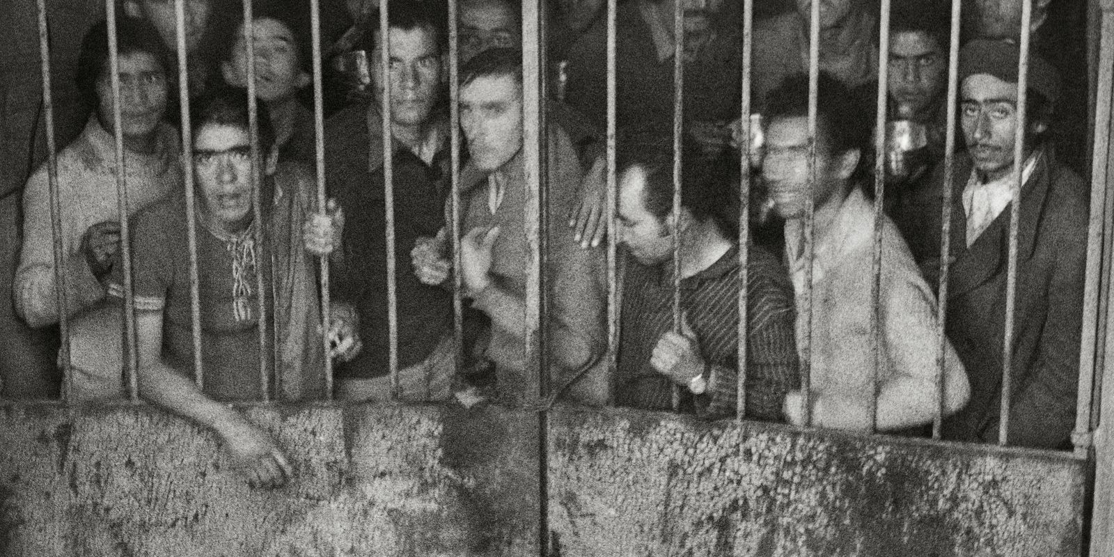 The display showcases the work of news photographer Evandro Teixeira